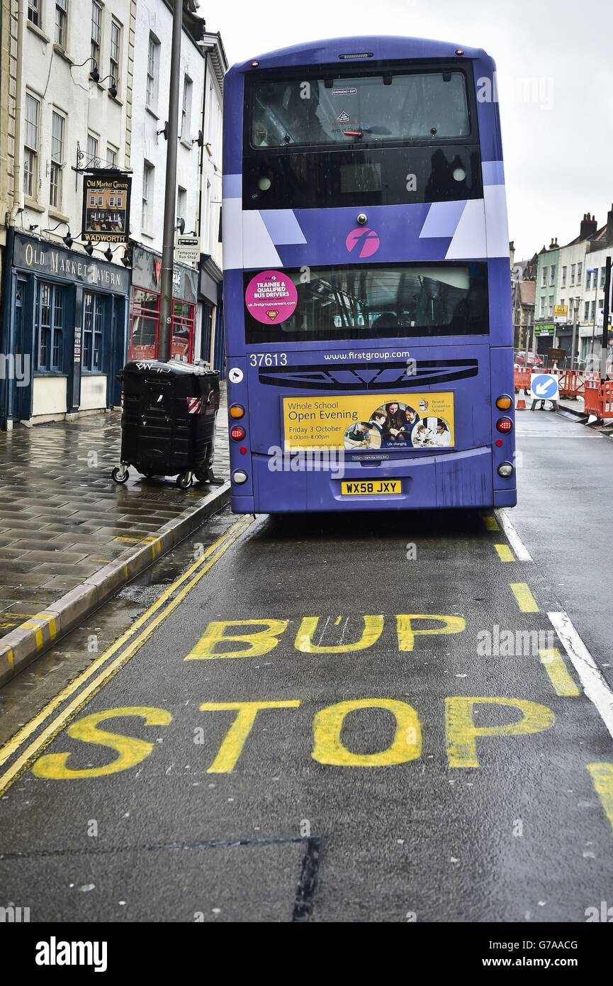 A bus passes a bus stop in Bristol, on Old Market Street which has been ...