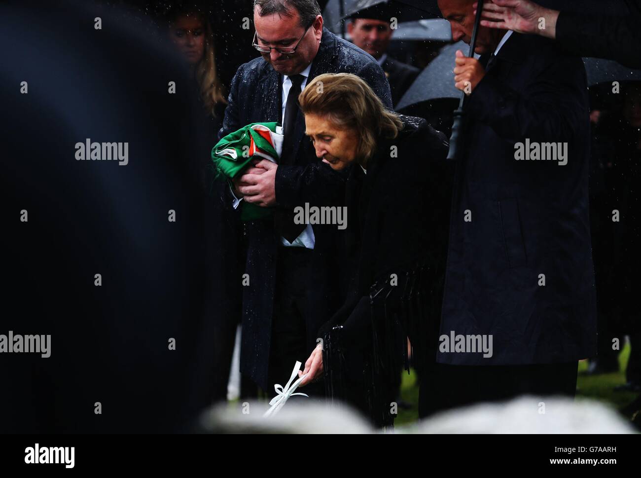 Wife of former Taoiseach Albert Reynolds Kathleen Reynolds places a ...