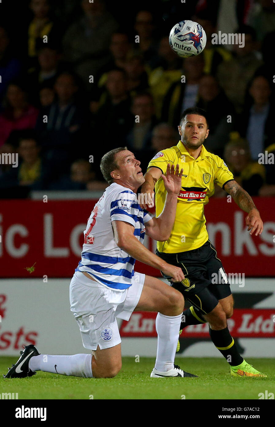 Queens Park Rangers' Richard Dunne and Burton Albion's Dominic Knowles ...