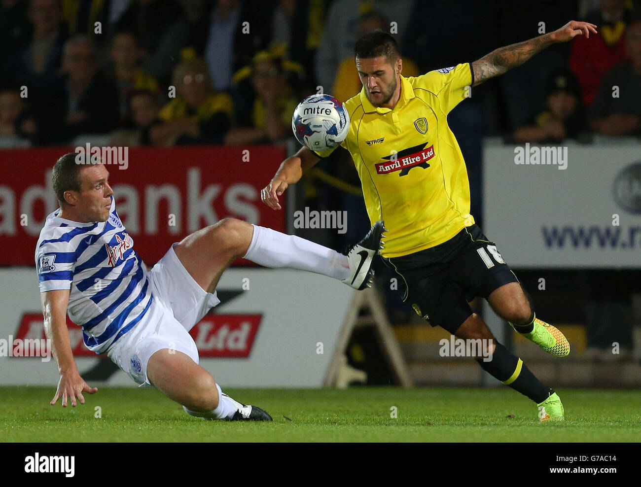 Queens Park Rangers' Richard Dunne and Burton Albion's Dominic Knowles ...