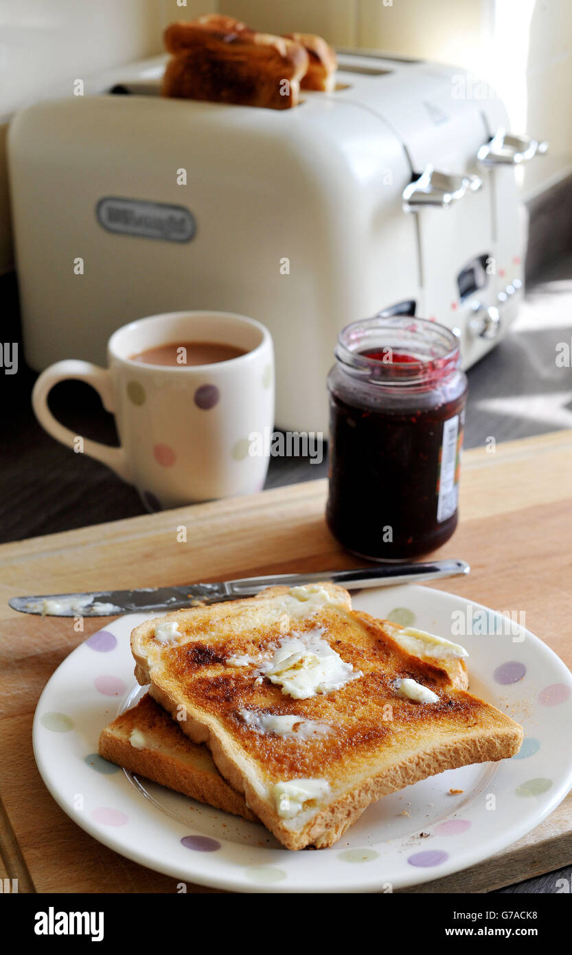 Lifestyle - Toasted Bread, Cup of Tea and Jam Jar Stock Photo - Alamy