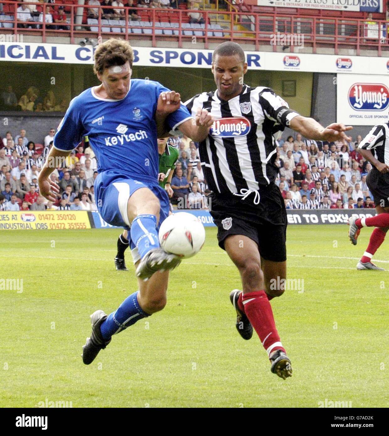 Sport football action justin whittle gareth griffiths hi-res stock ...