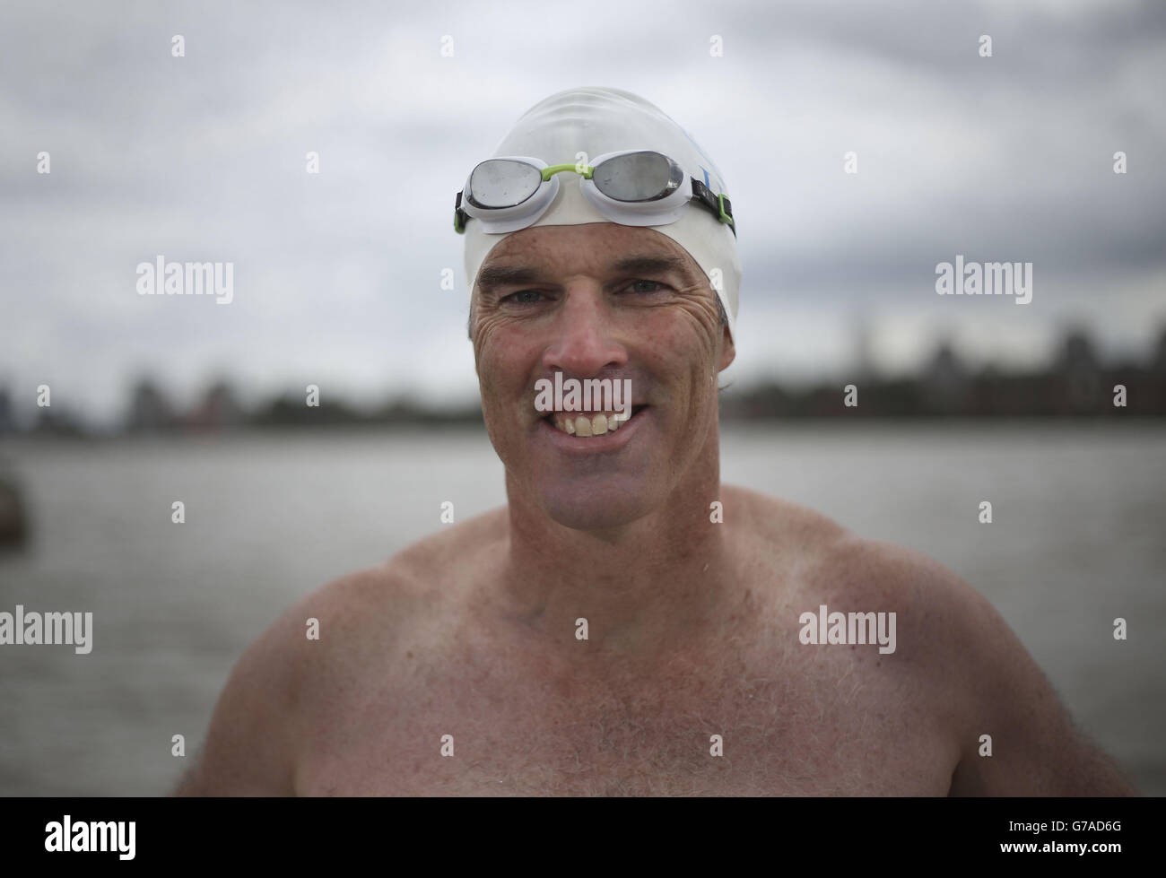Lewis Pugh after swimming up the Thames to the Thames Barrier in his ...