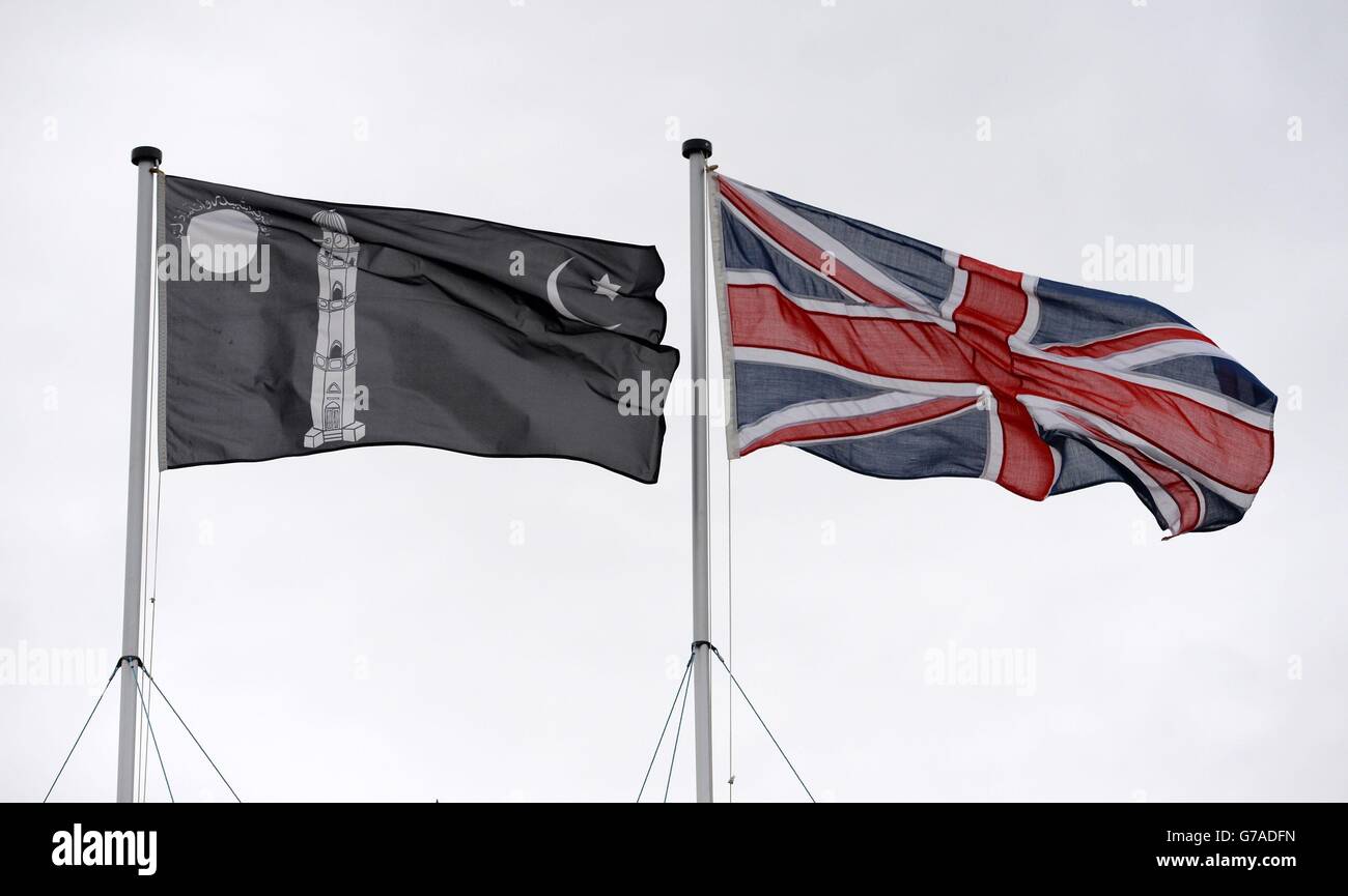 The Ahmadiyya Muslim Community flag flies next to the Union Flag as ...