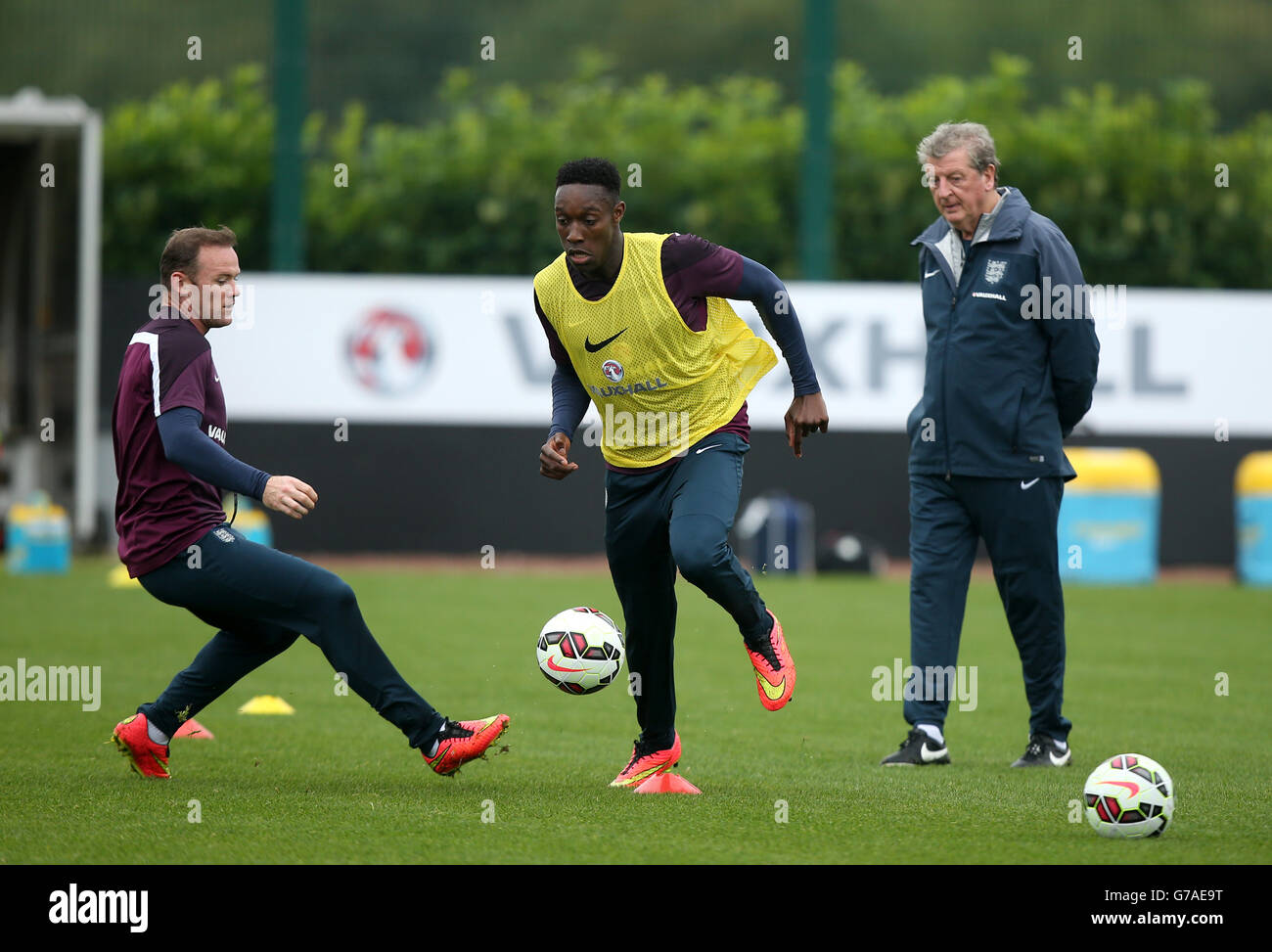 England's Danny Welbeck (centre) is watched by Wayne Rooney (left) and ...
