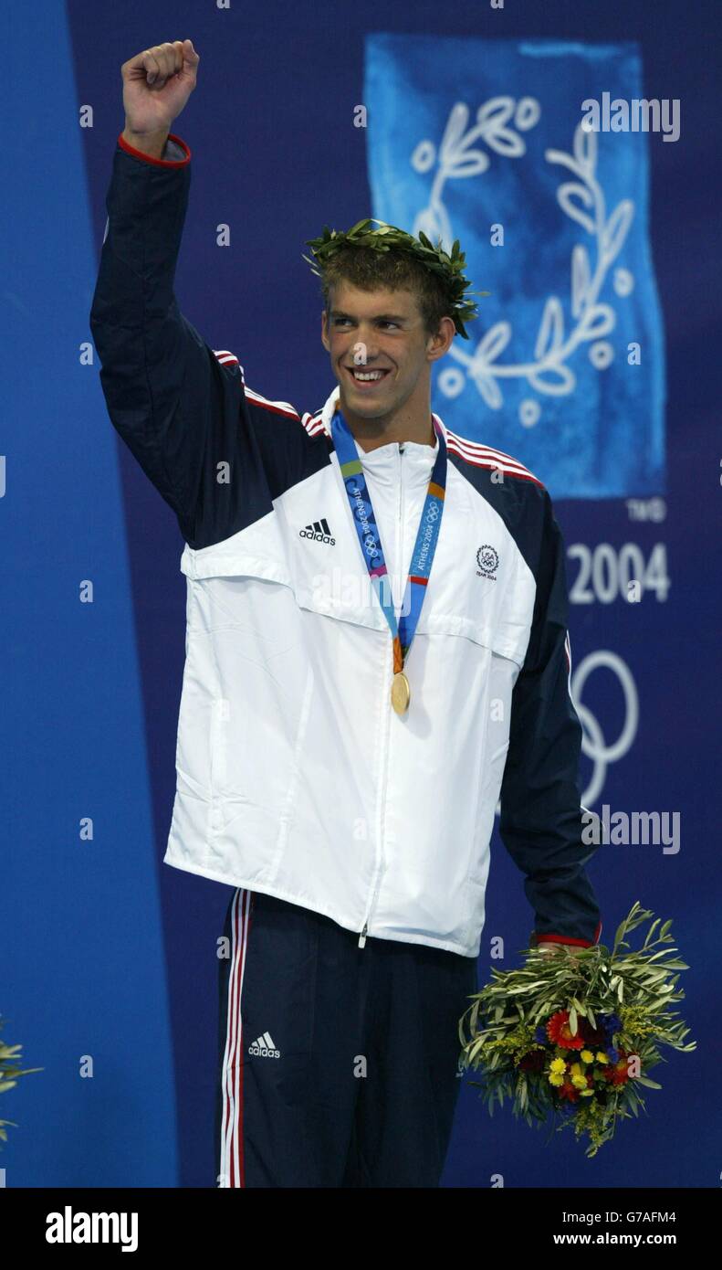 American swimmer Michael Phelps celebrates after winning a Gold medal ...