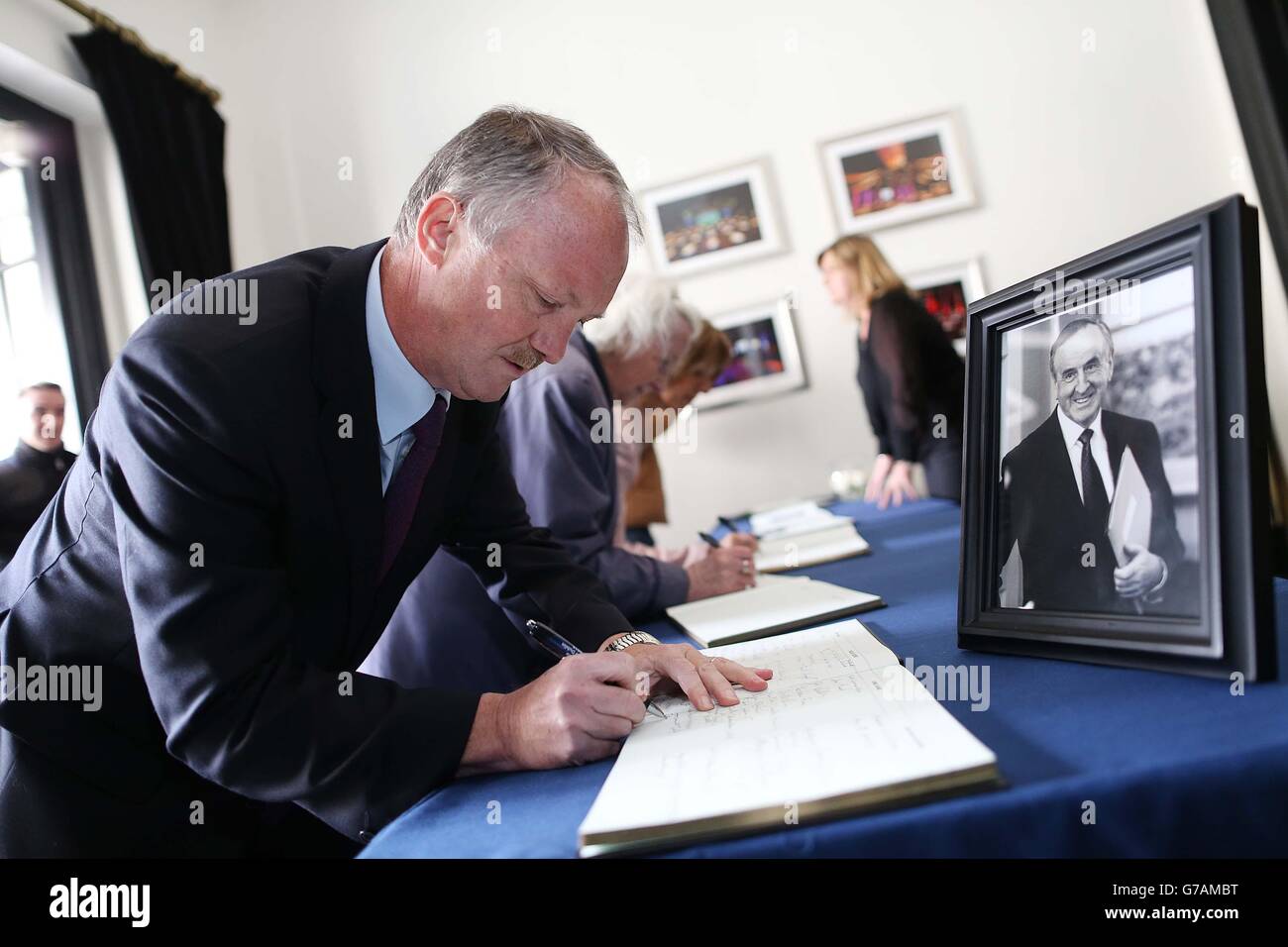 Fianna Fail Politician Sean Haughey signing the book of condolences to ...