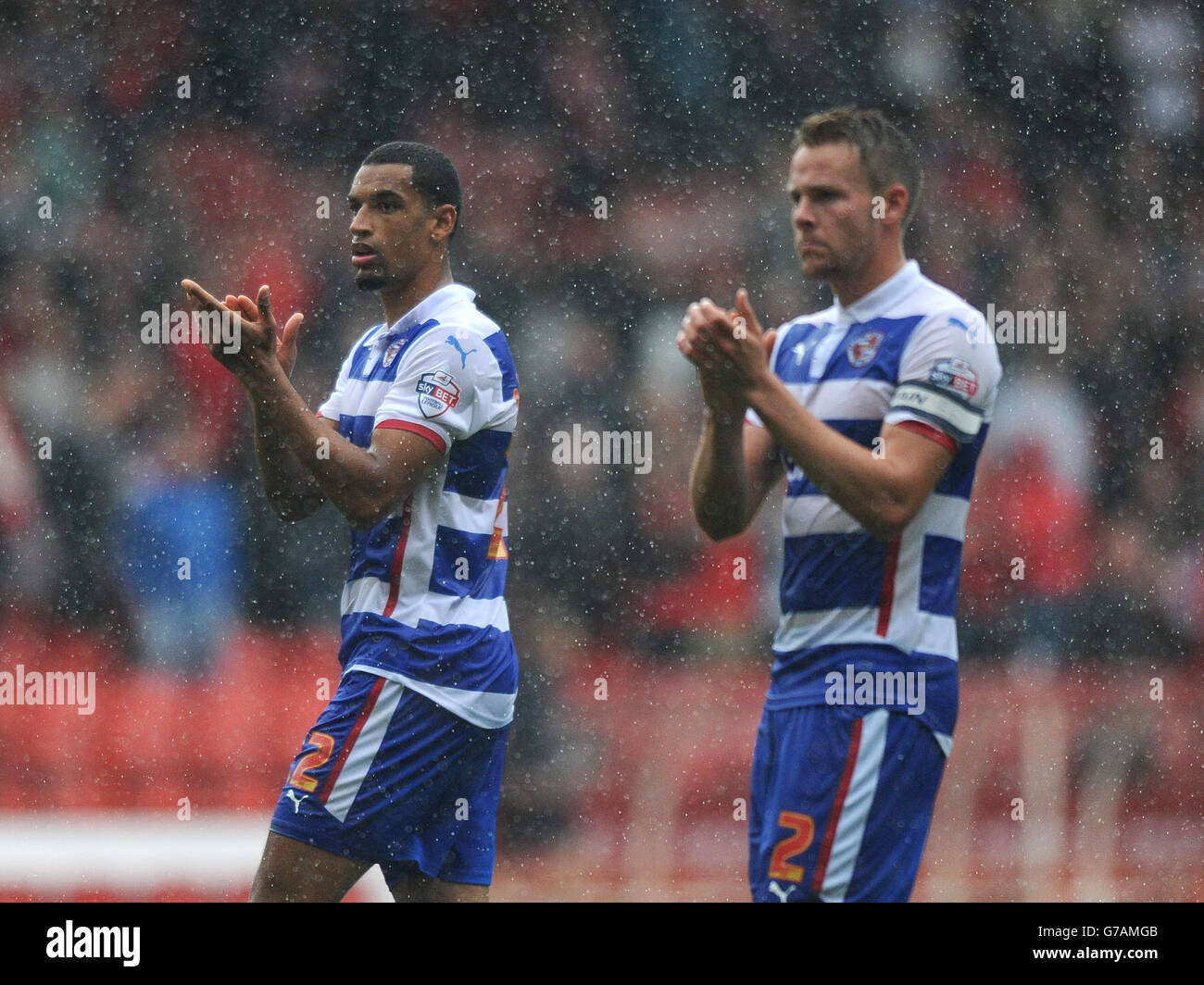 Reading's Nick Blackman (left) and Chris Gunter look dejected as they ...