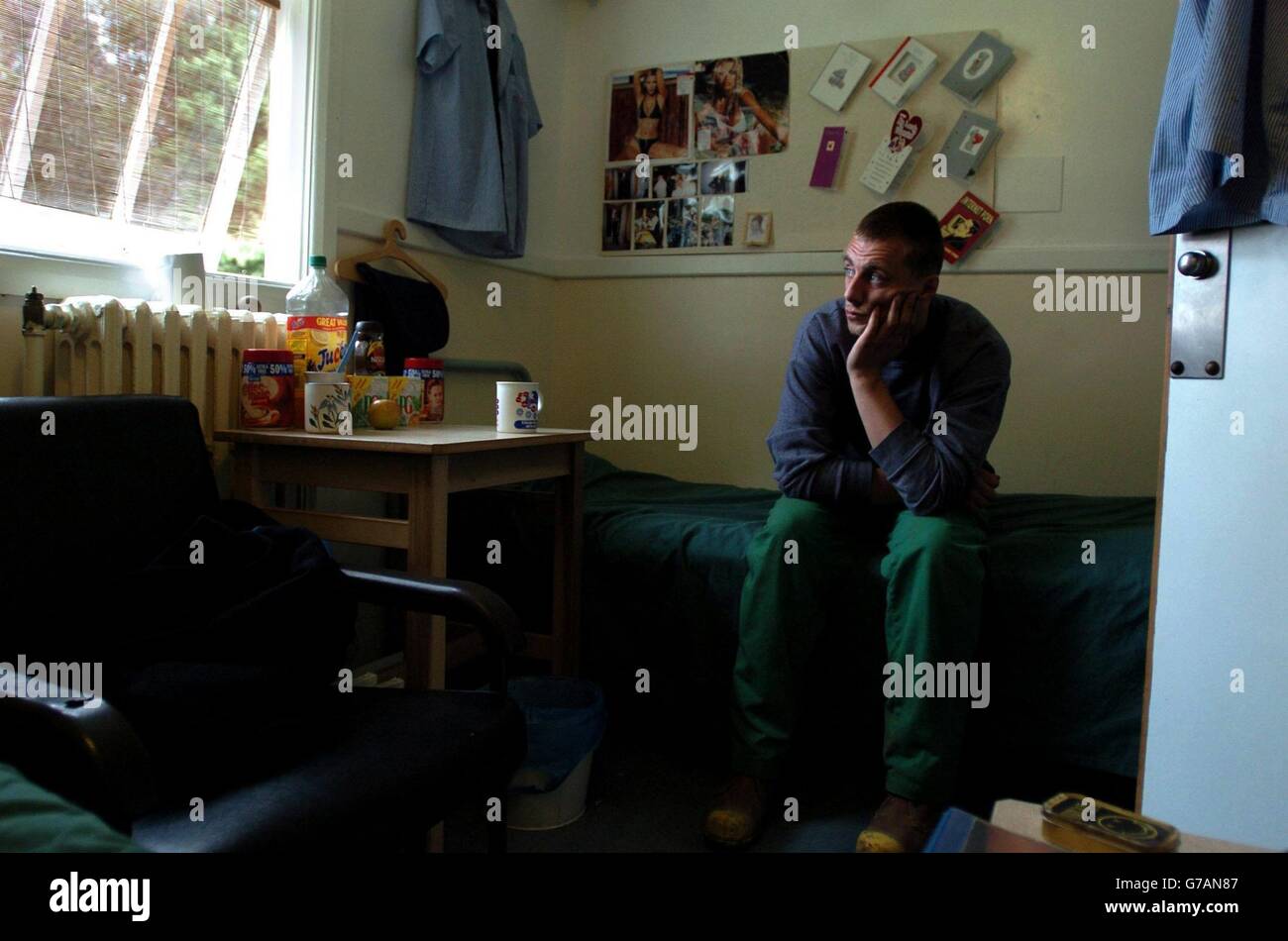 An inmate sits in his room at North Sea Camp open prison in Boston ...