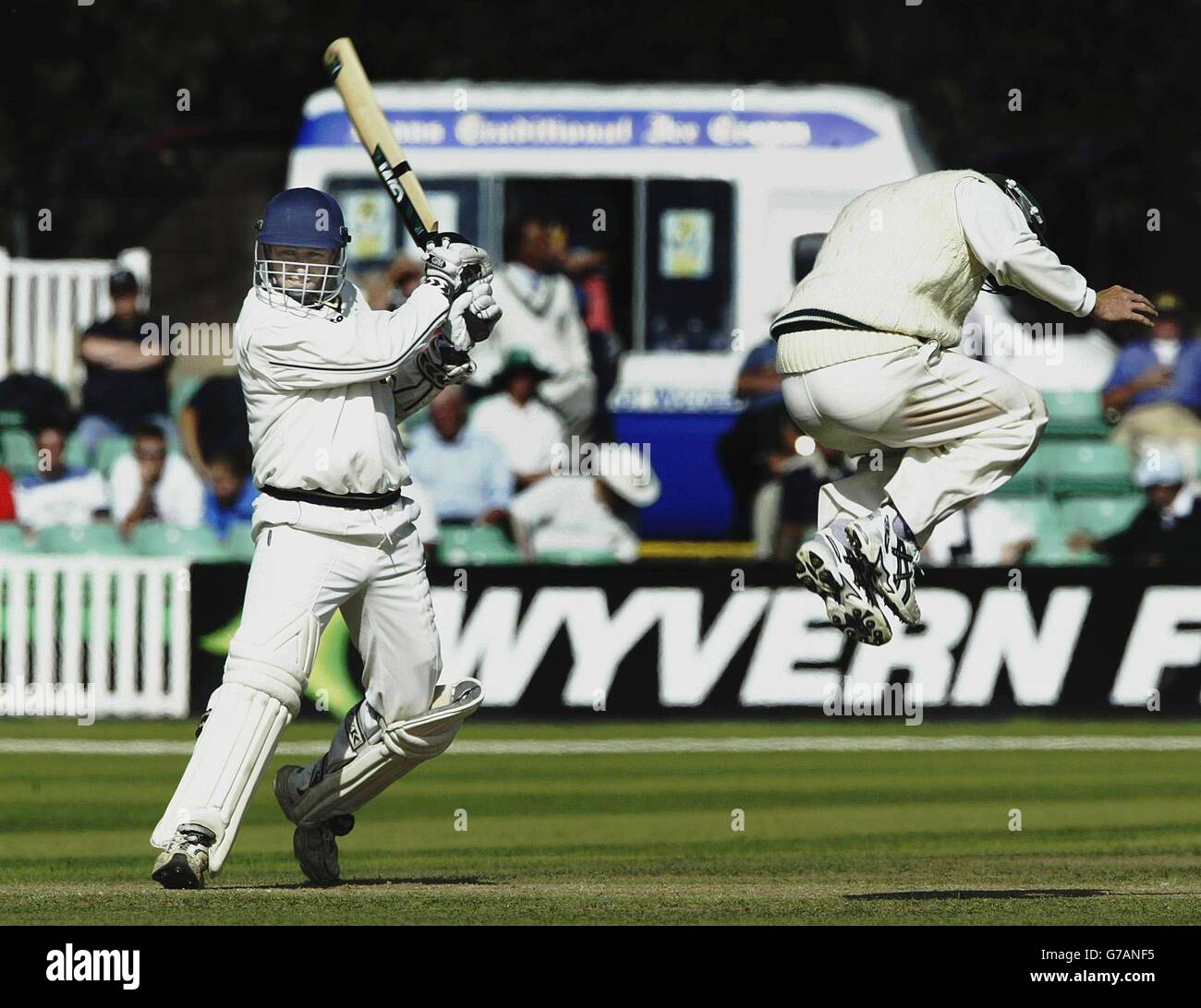 Worcestershire fielder Ben Smith (right) takes evasive action from ...