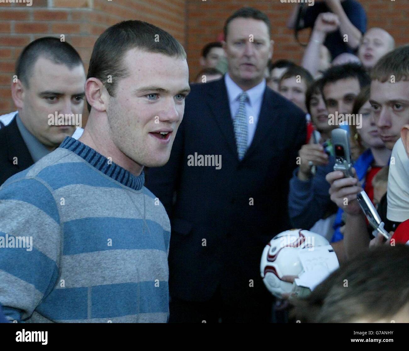 Wayne Rooney signs autographs outside Old Trafford, after Manchester ...