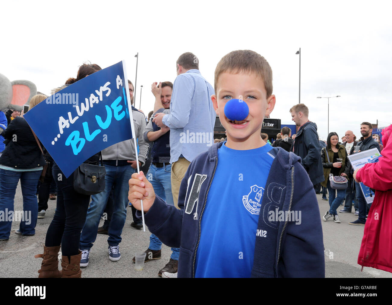 A young Everton fan shows support for his team before the Barclays ...