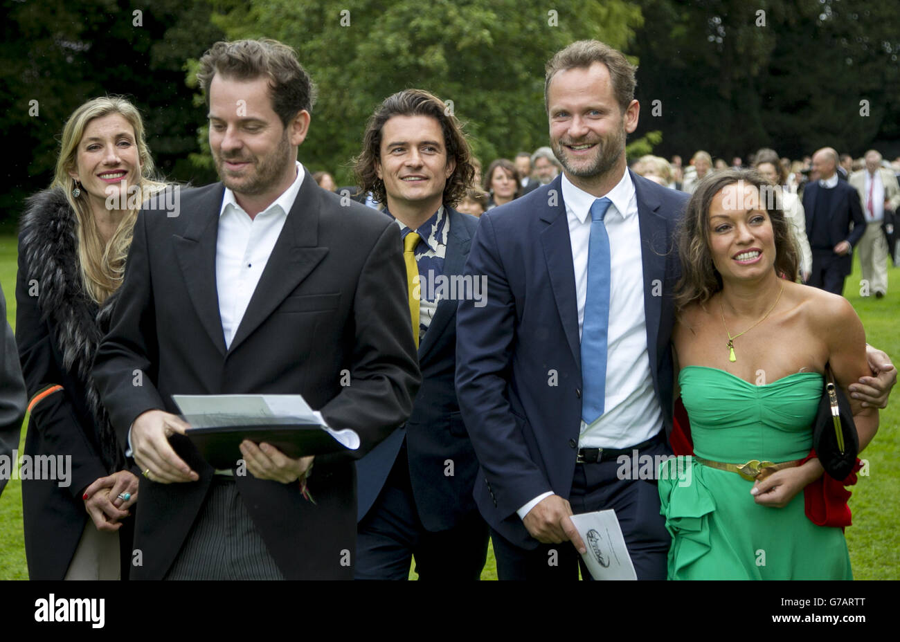Actor Orlando Bloom (centre) attending the wedding of Flora Montgomery ...
