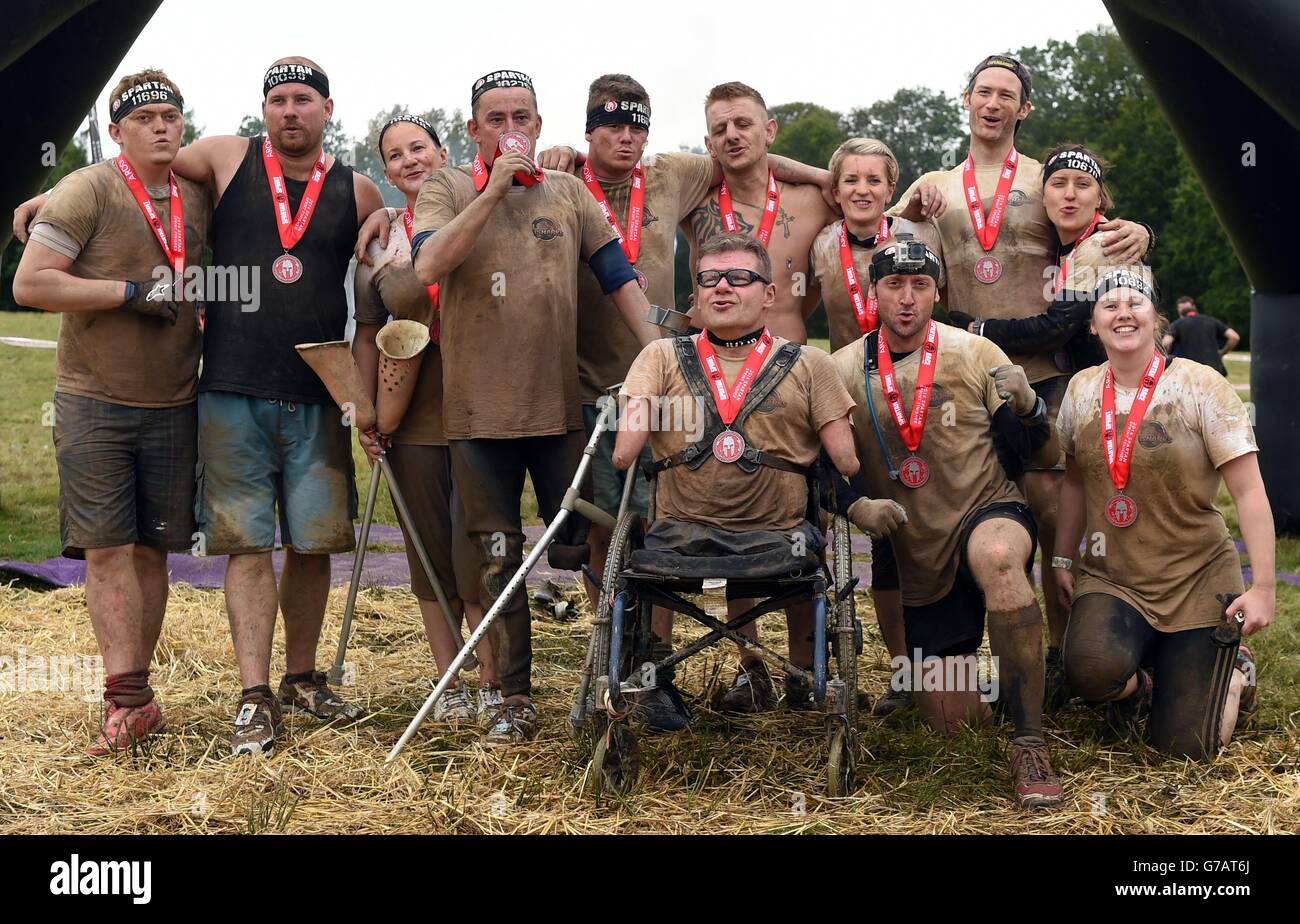 British Paralympic Gold medalist Peter Hull (centre) and his team after ...