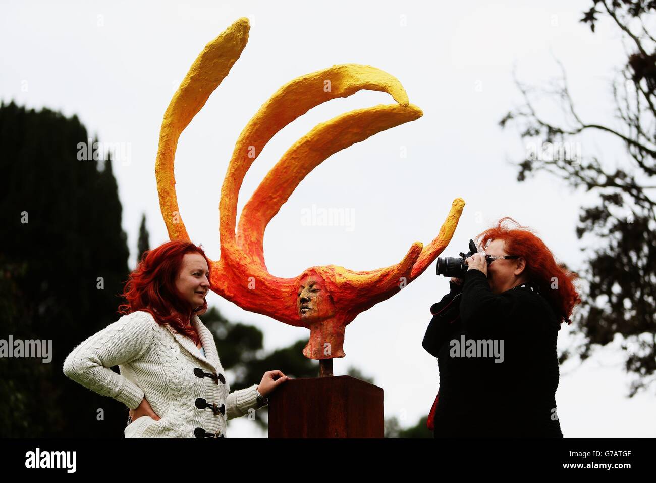 Elizaveta Komarova (left) and her mother Alla Komarova take pictures ...
