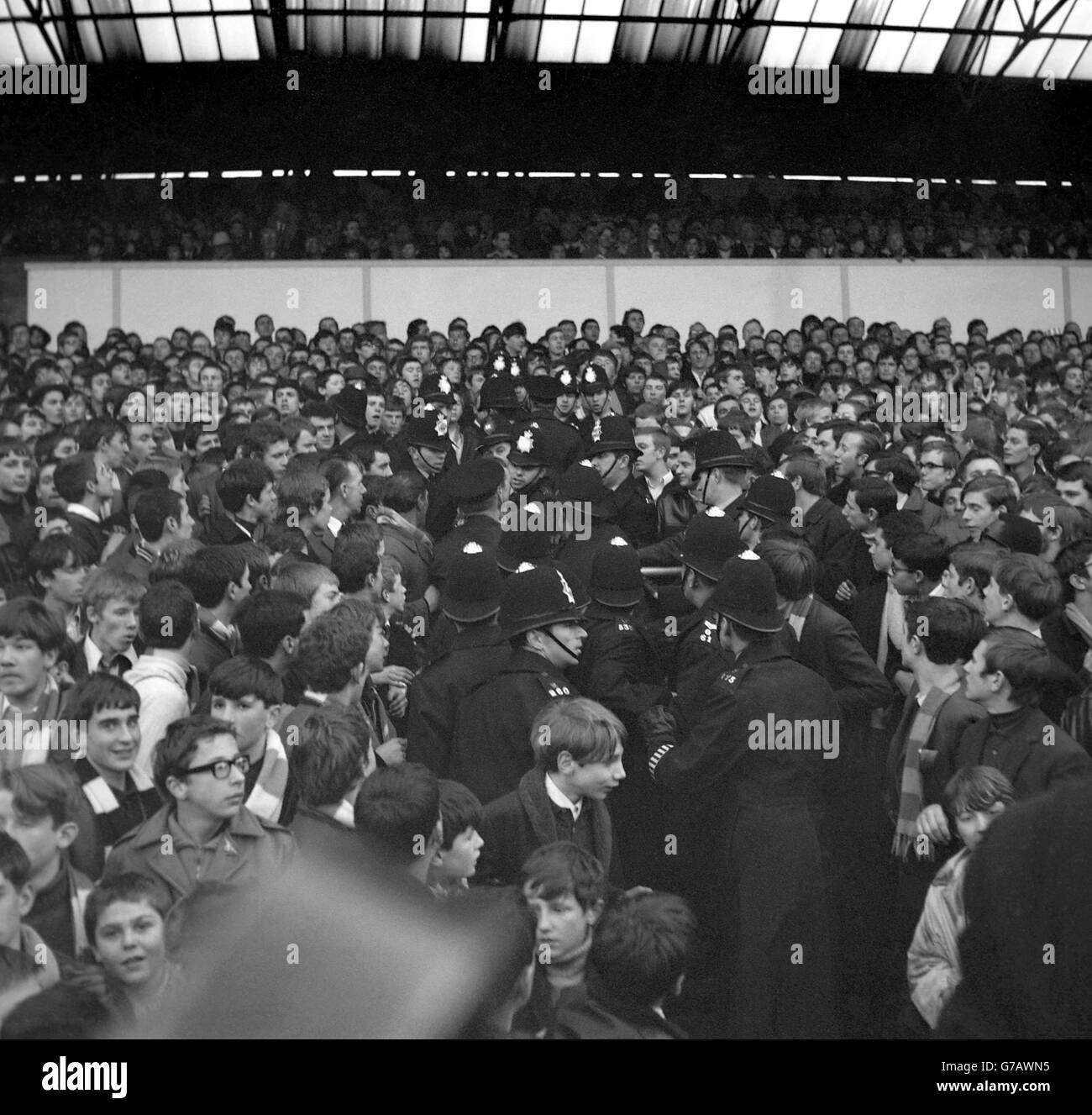 Sport football policemen fans crowds hi-res stock photography and ...