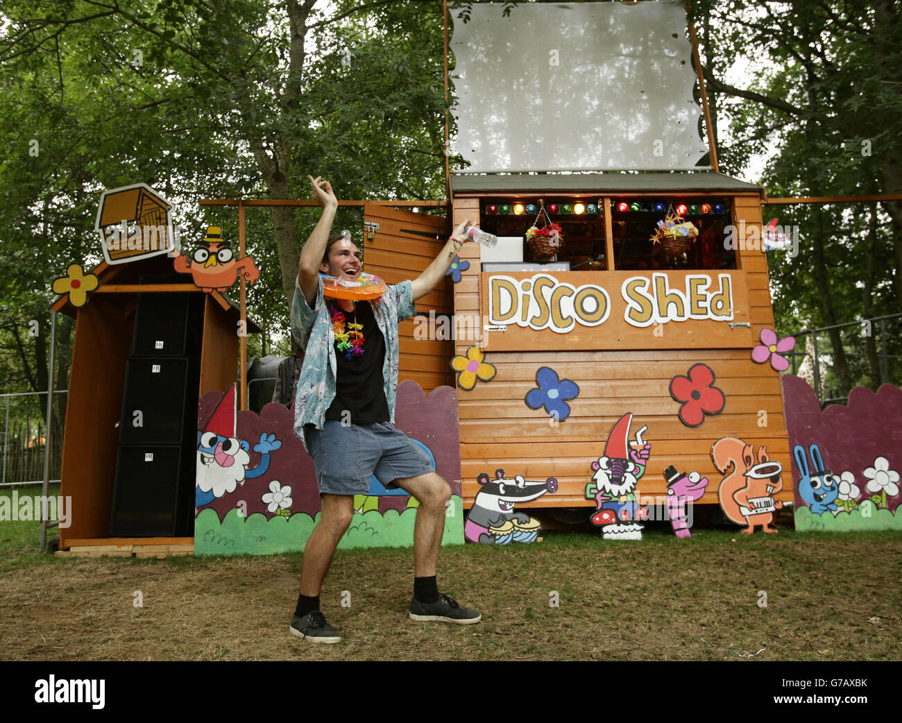 Bestival 2014 - Day Two. A festival goer dancing outside the Disco Shed ...