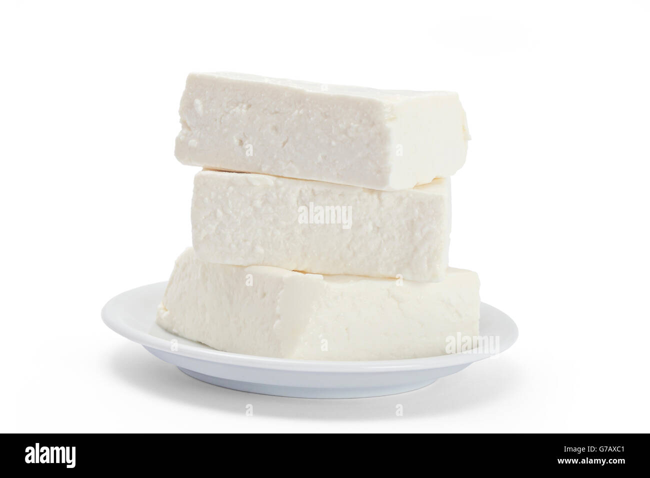 Fresh cheese from cow's milk on white background Stock Photo - Alamy