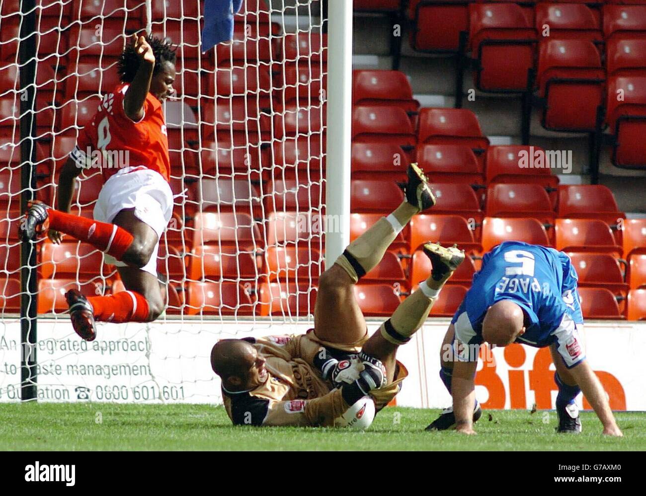 Cardiff goalkeeper Tony Warner collides with Nottingham Forest's David ...