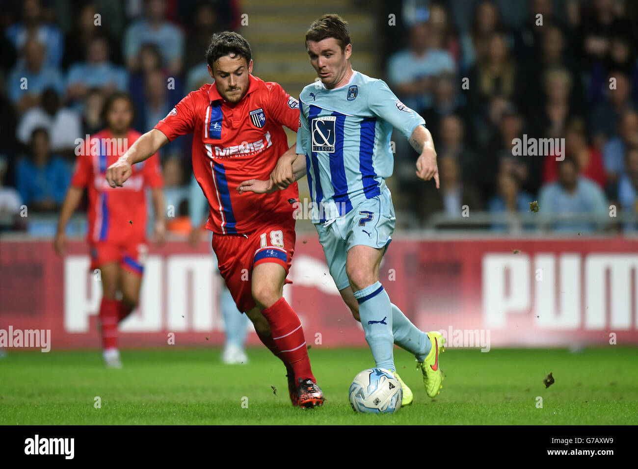 Gillingham's Josh Pritchard (left) and Coventry City's John Fleck ...