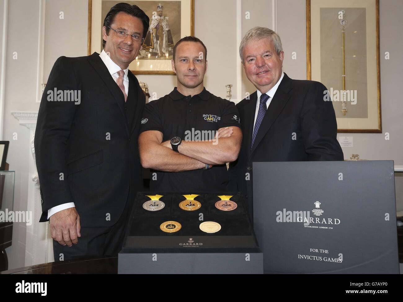 (left to right) Garrard CEO Eric Deardorff, Sergeant Craig Gadd and ...