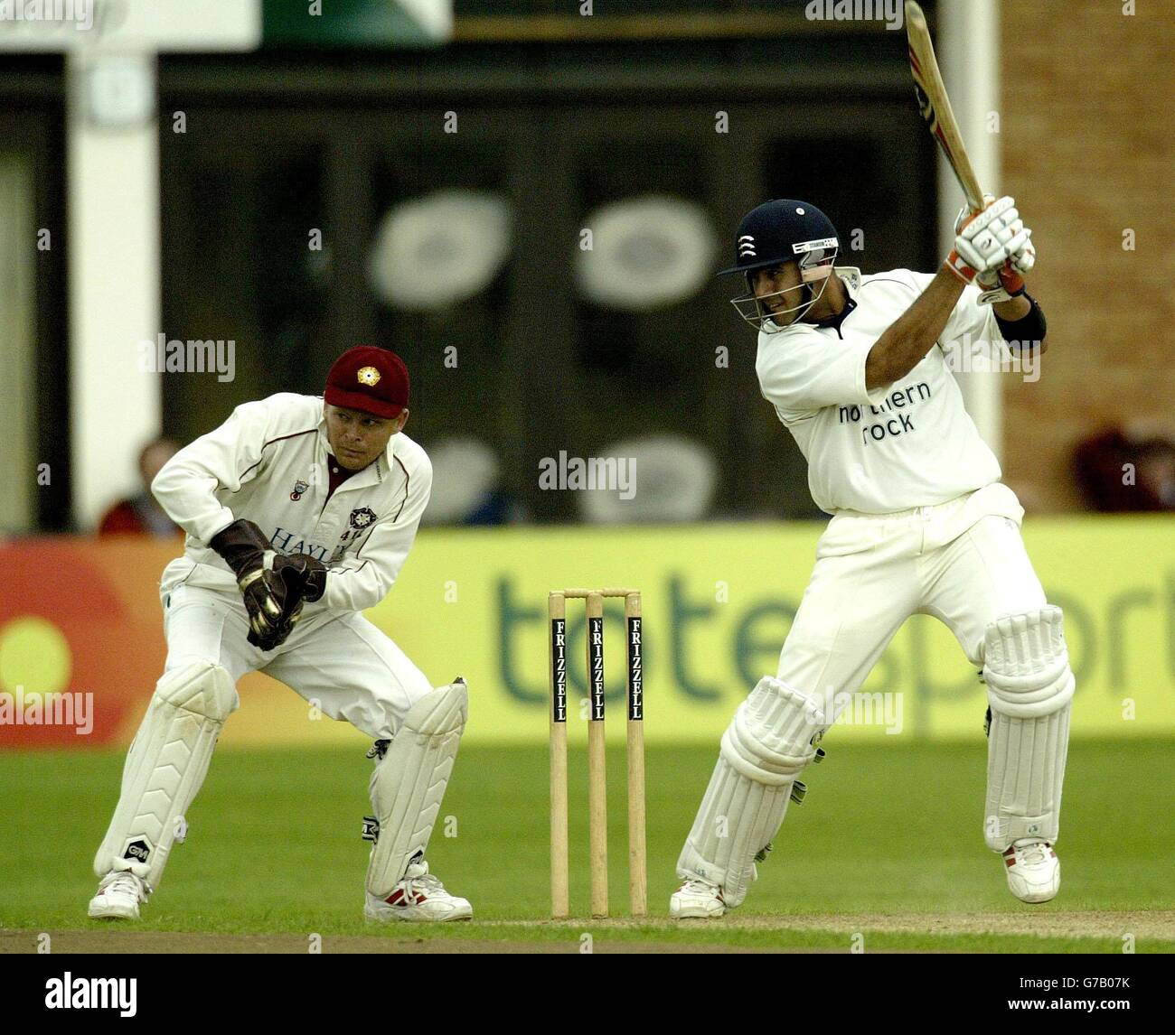Middlesex batsman Owais Shah cut the ball square for four runs past ...