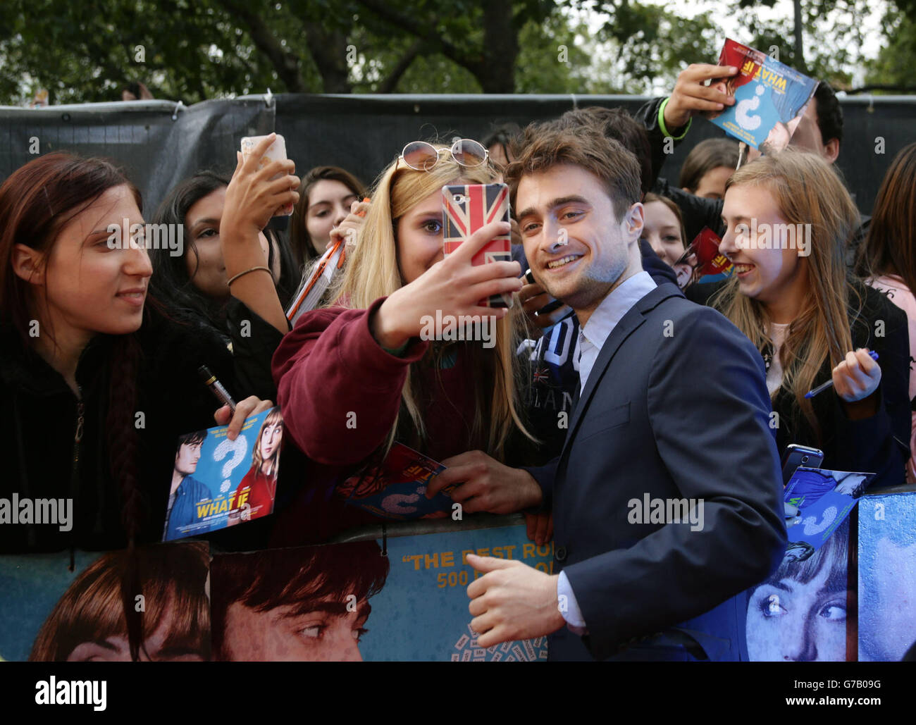 Daniel Radcliffe with fans as he attends the premiere of What If at the ...