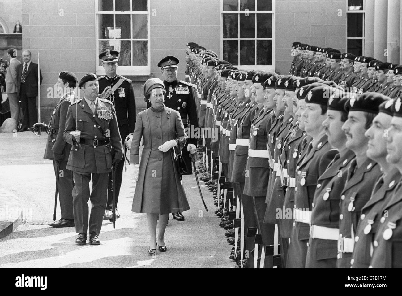 The Queen inspecting a guard of honour mounted by the Ulster Defence ...