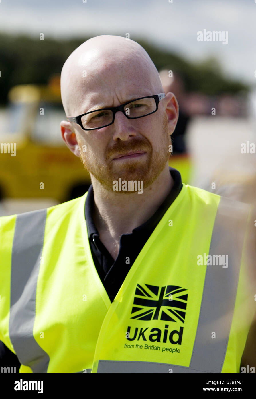DFID humanitarian programme manager Bob Gibbons as cargo from UK Aid is ...
