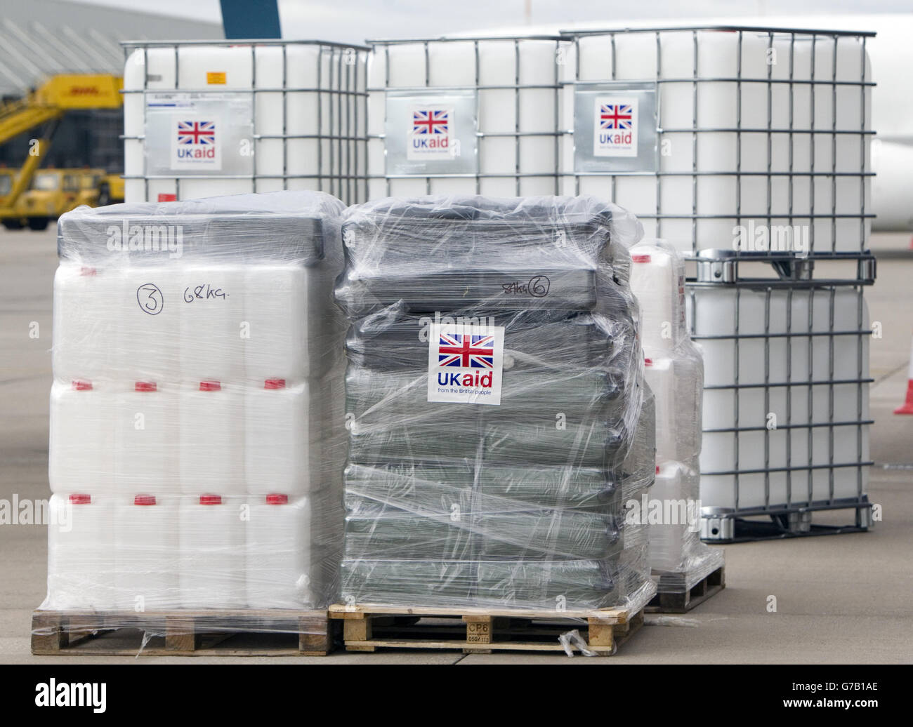 Cargo from UK Aid waits to be loaded on to an Antonov An-12B aircraft ...