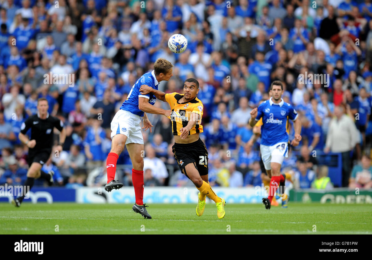 Portsmouth's Paul Robinson (left) and Cambridge United's Kwesi Appiah ...