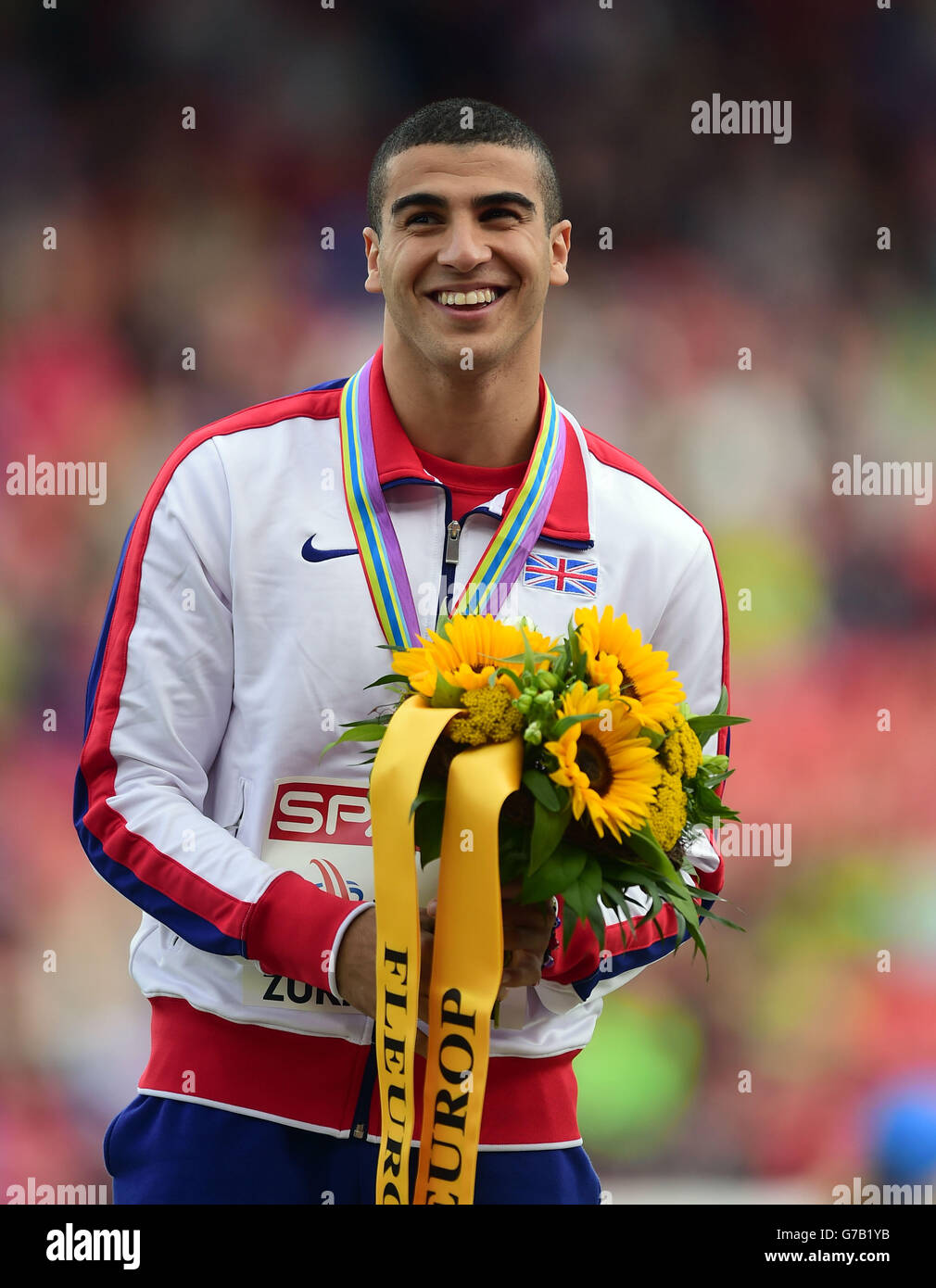 Great Britain's Adam Gemili celebrates with his Gold medal for winning ...