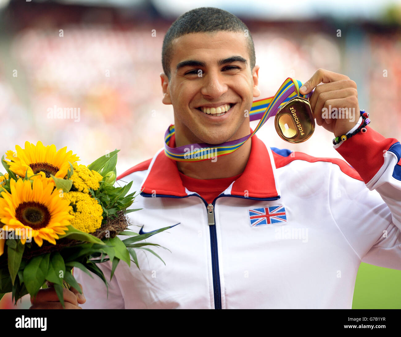 Great Britain's Adam Gemili celebrates with his Gold medal after ...