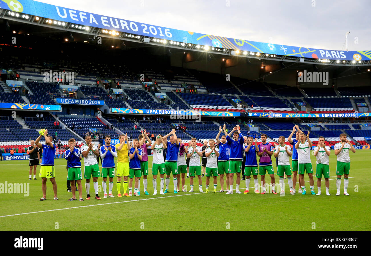 Northern Ireland players applaud the fans after the round of 16 match ...