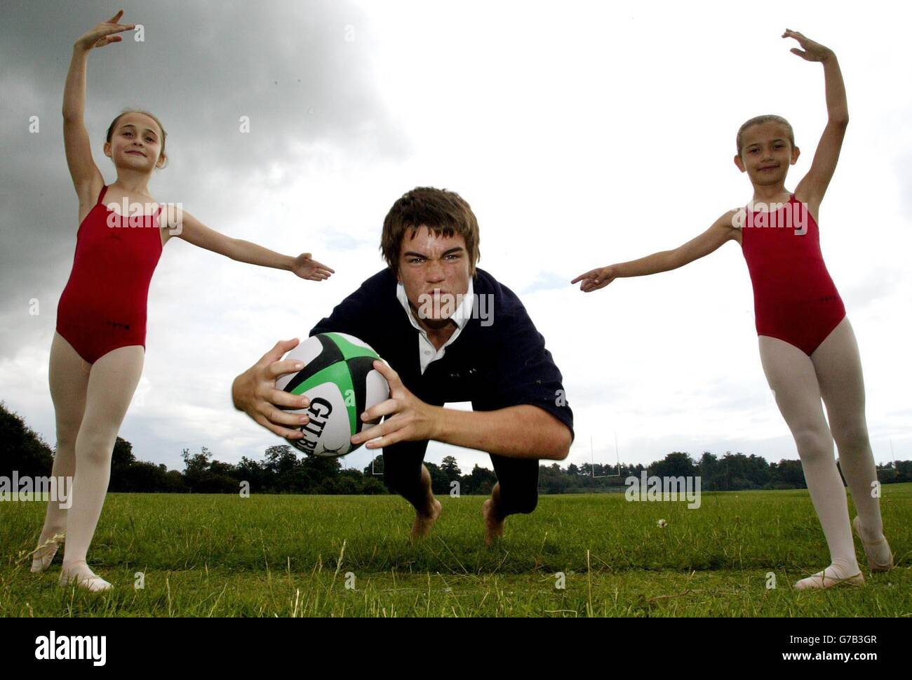 Matthew Williams dives for a try between ballerinas, Chloe Pennington ...