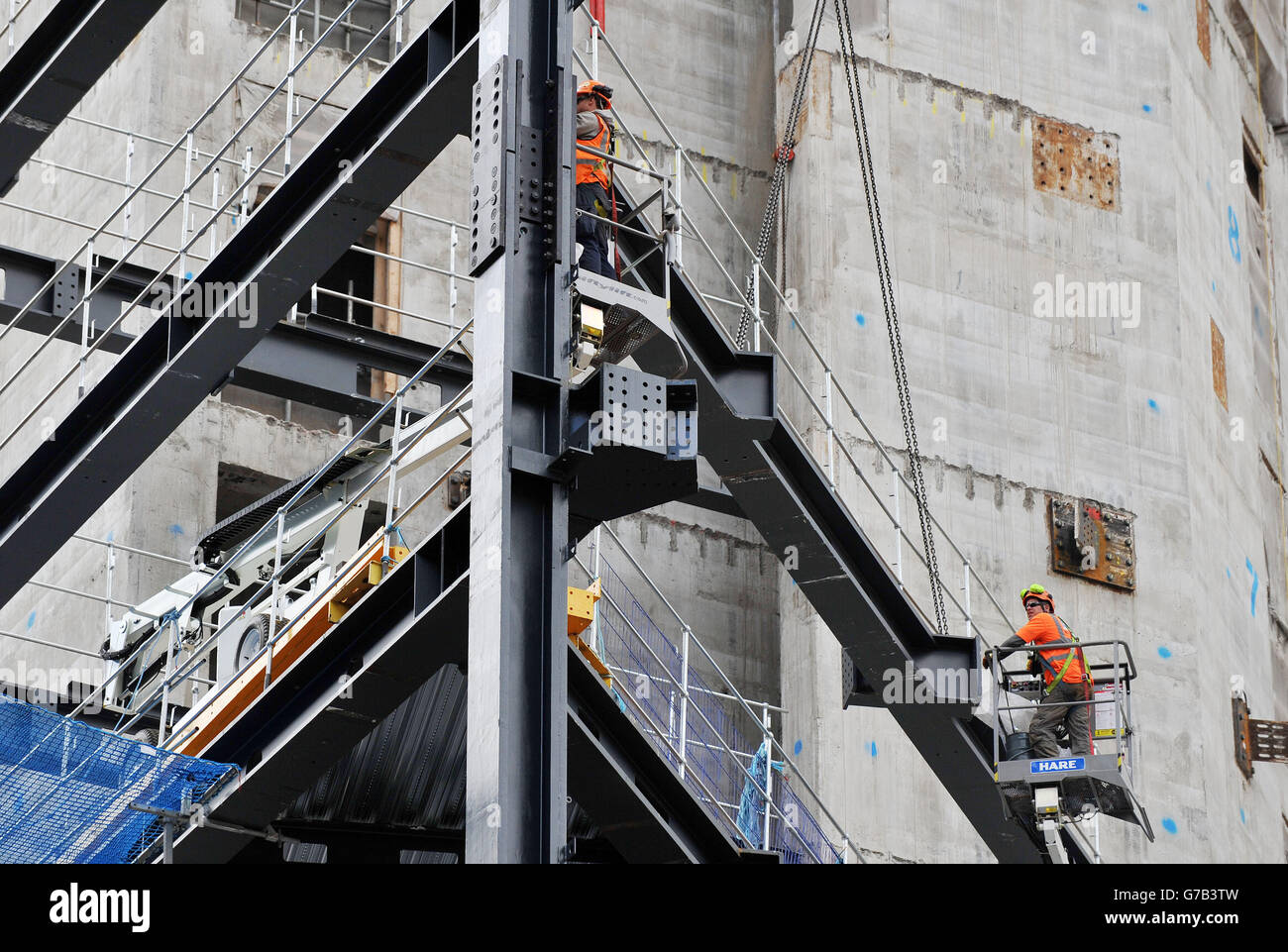 Stock photo of construction workers at the construction site of the new ...