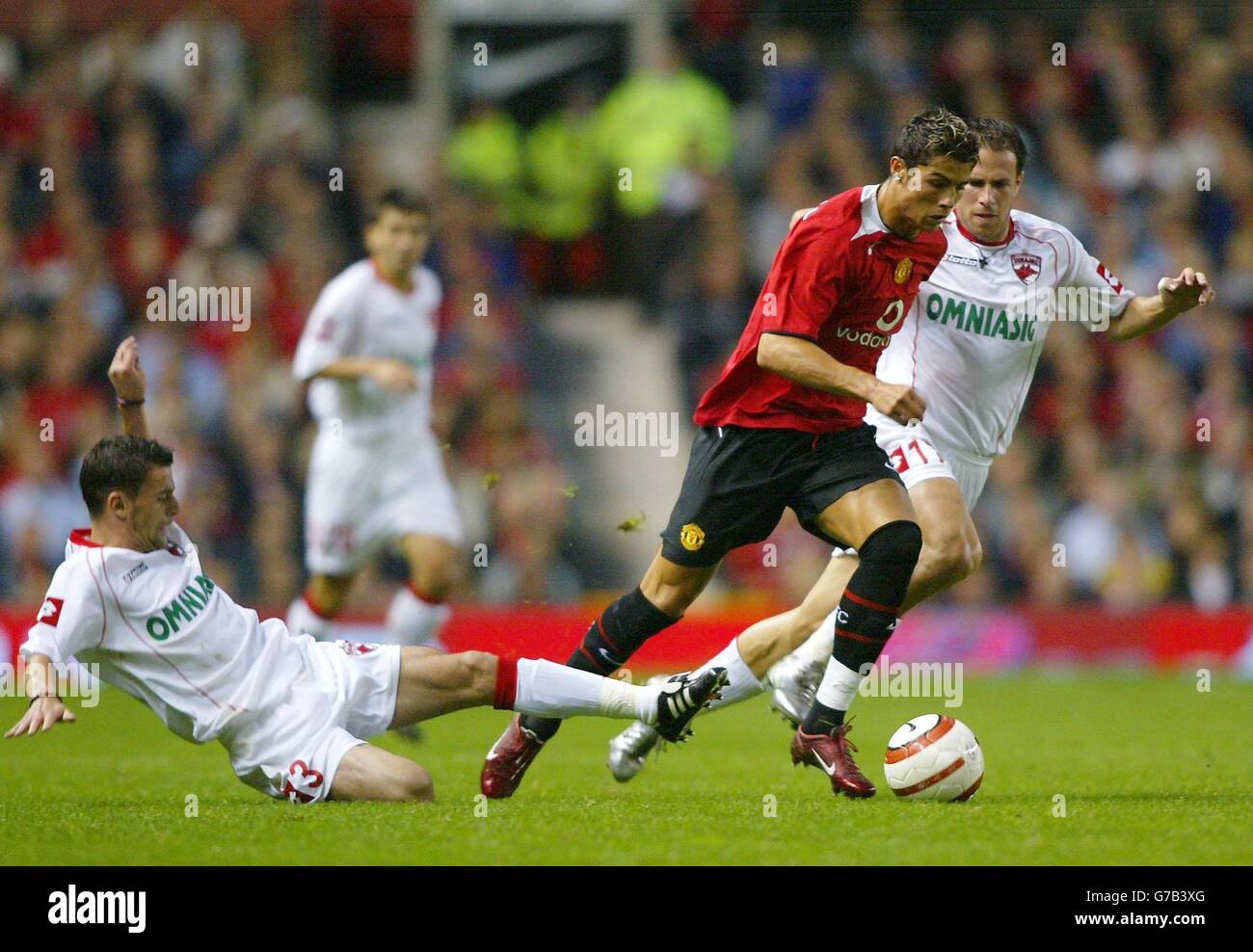 Manchester United's Cristiano Ronaldo evades the challenges of Dinamo ...