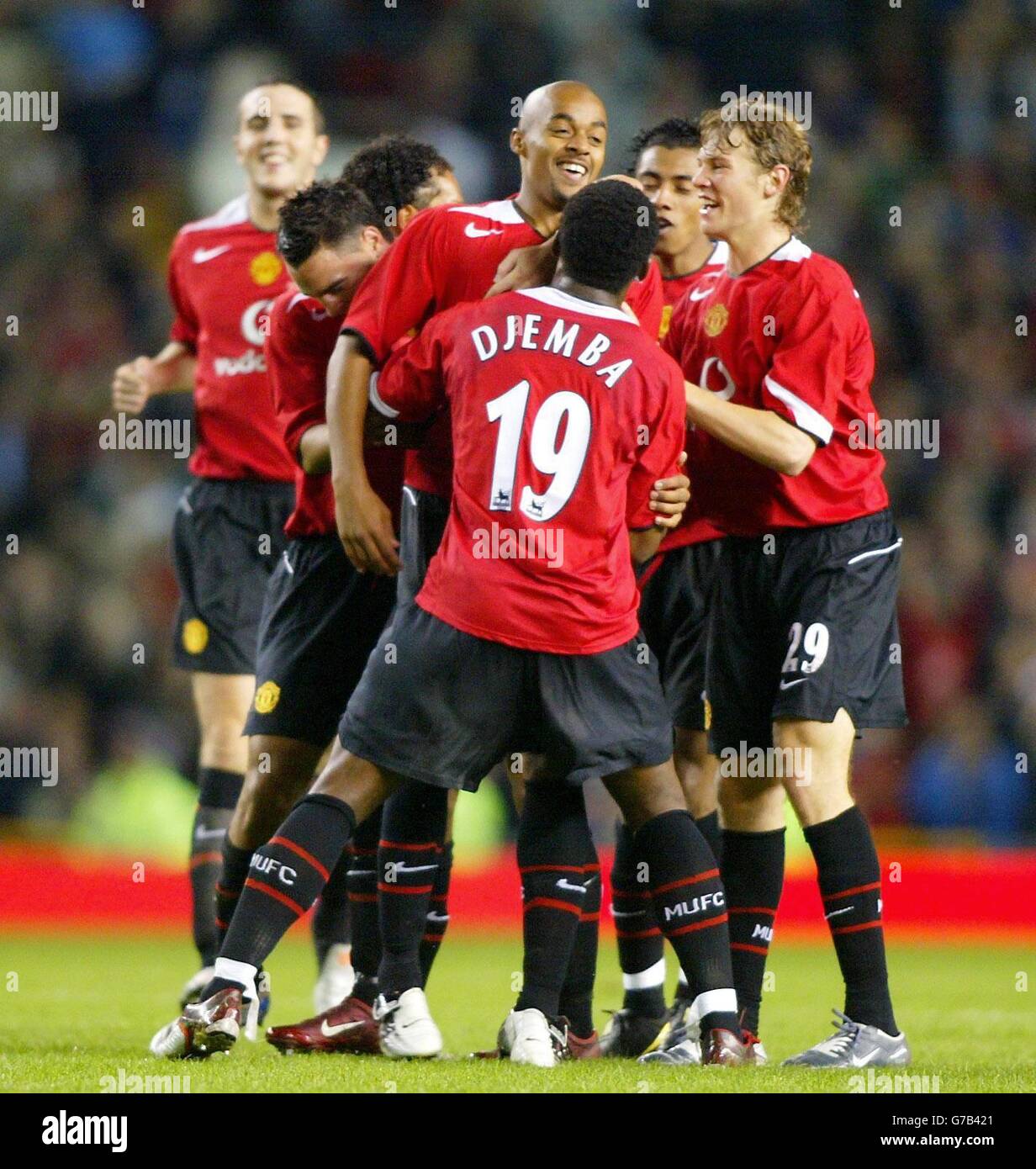 Manchester United's David Bellion (centre) celebrates scoring his ...