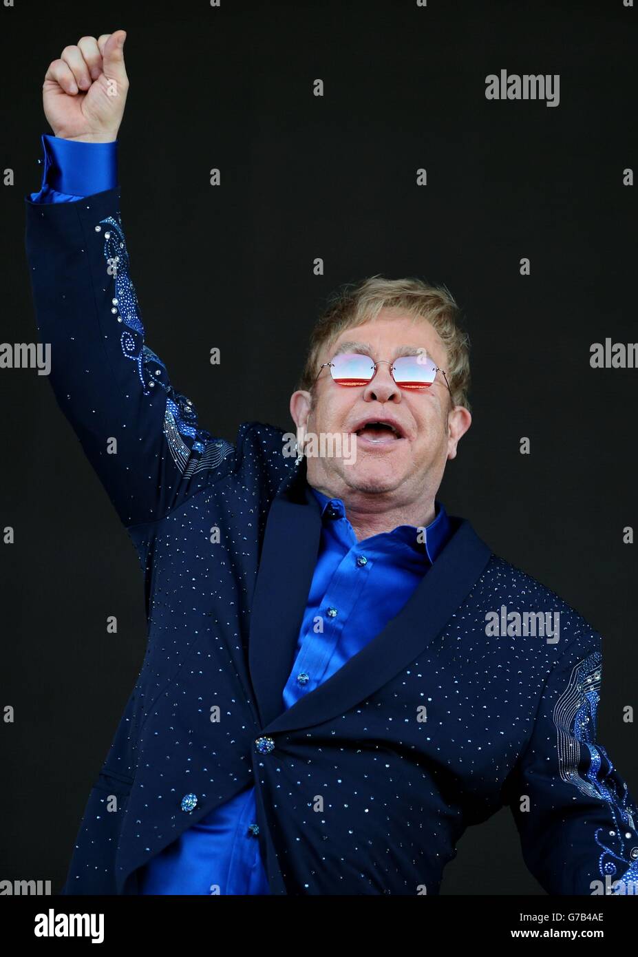 EDITORIAL USE ONLY Elton John performing on stage in a special open air ...