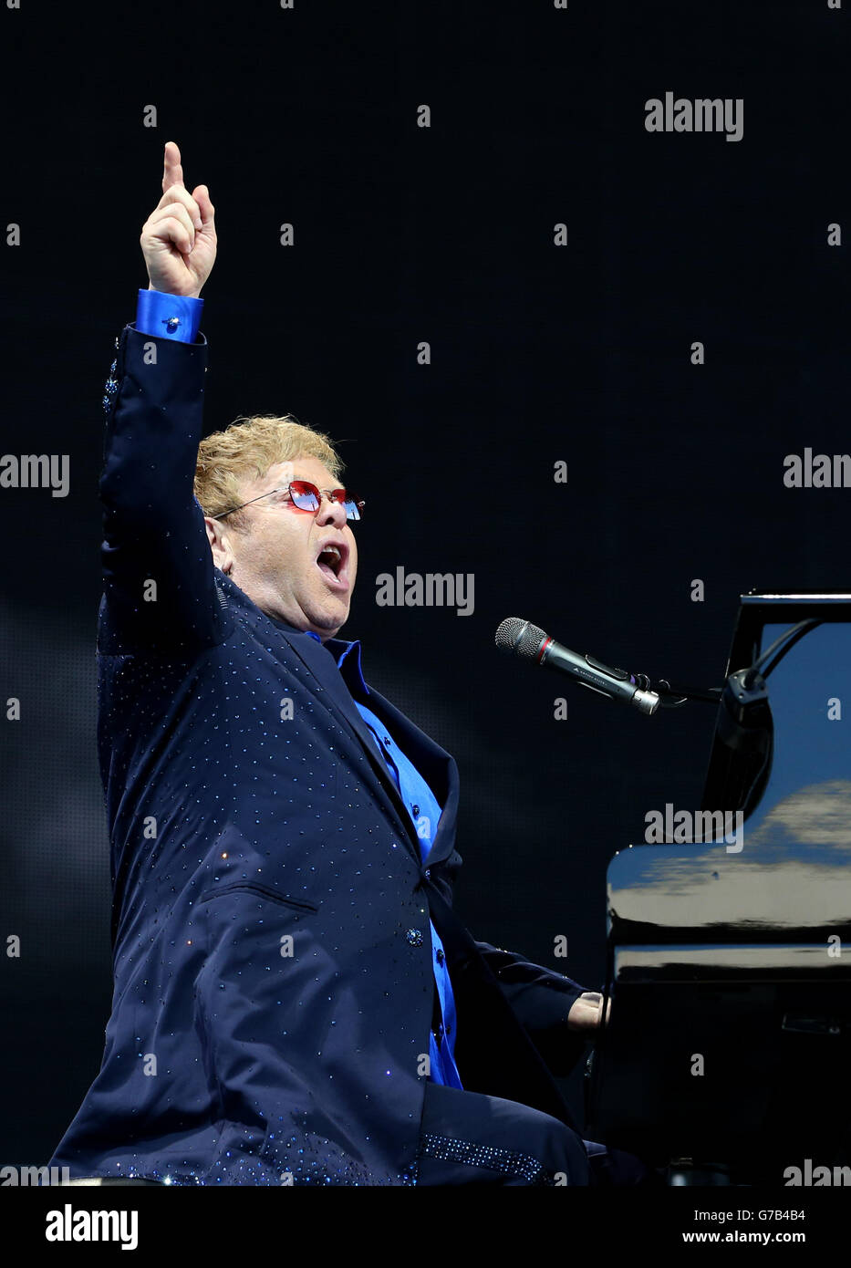 EDITORIAL USE ONLY Elton John performing on stage in a special open air ...