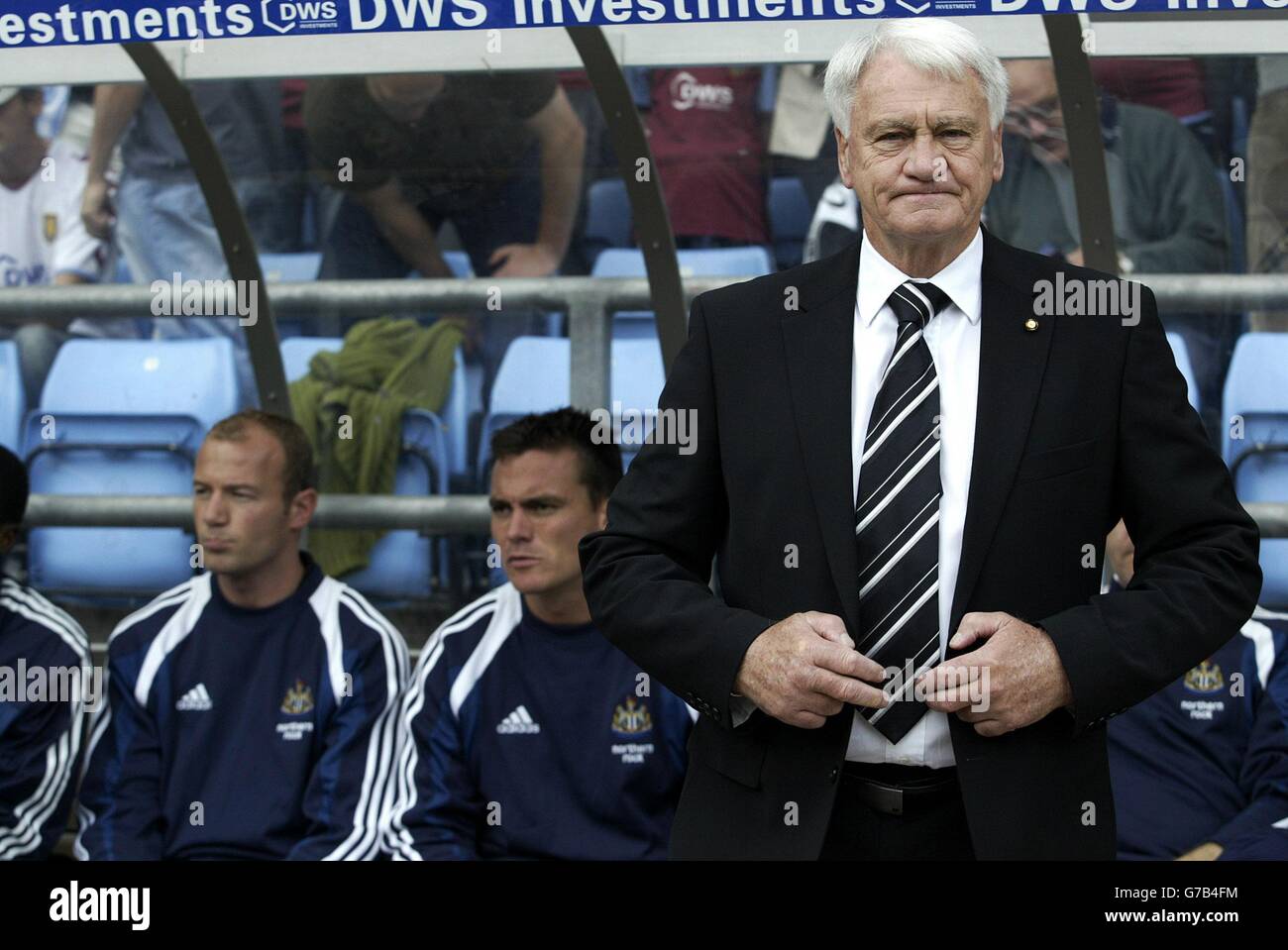 Newcastle United manager Sir Bobby Robson stands pitchside before his ...