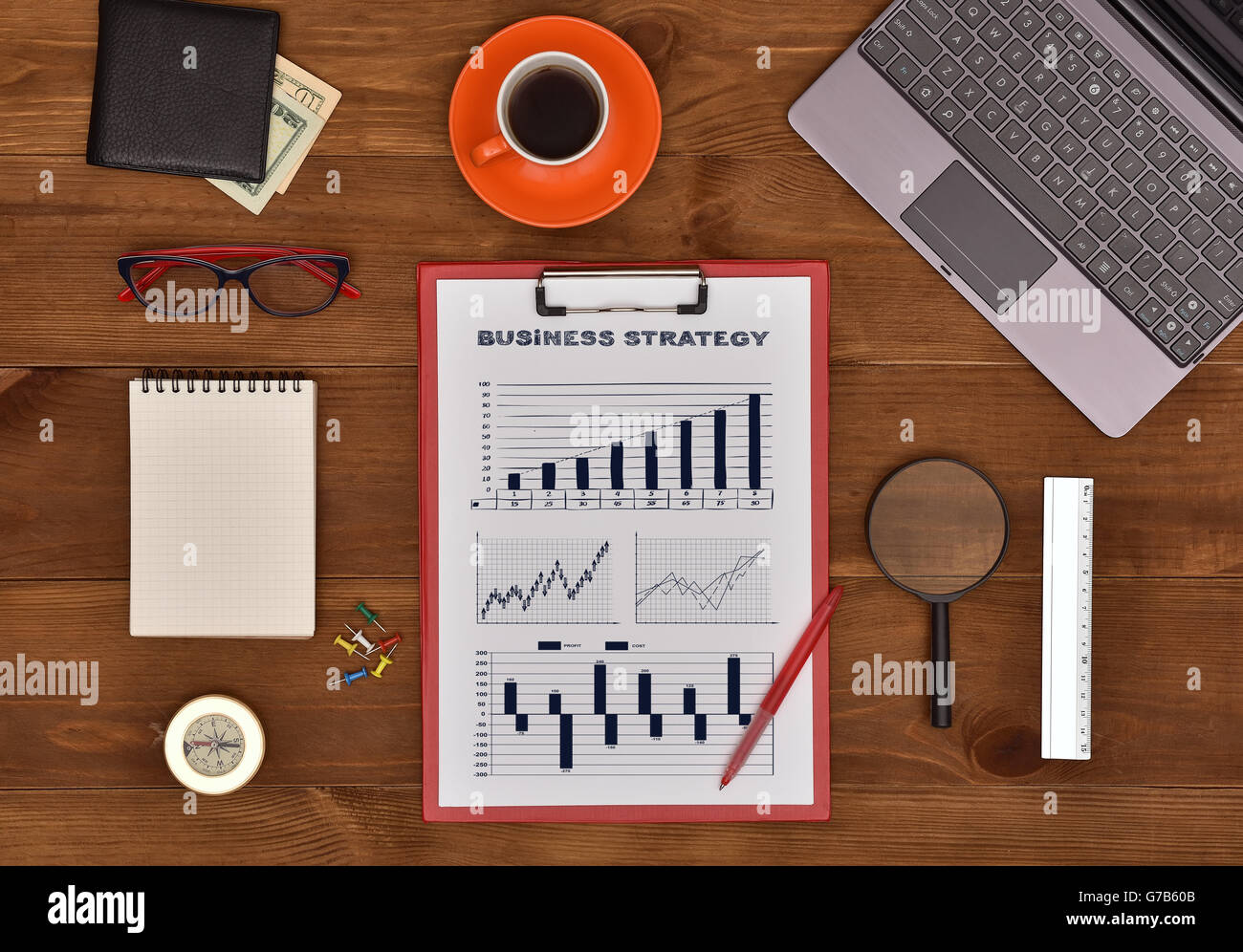 Clipboard with Drawing Buisness Strategy on Wooden Table Stock Photo ...
