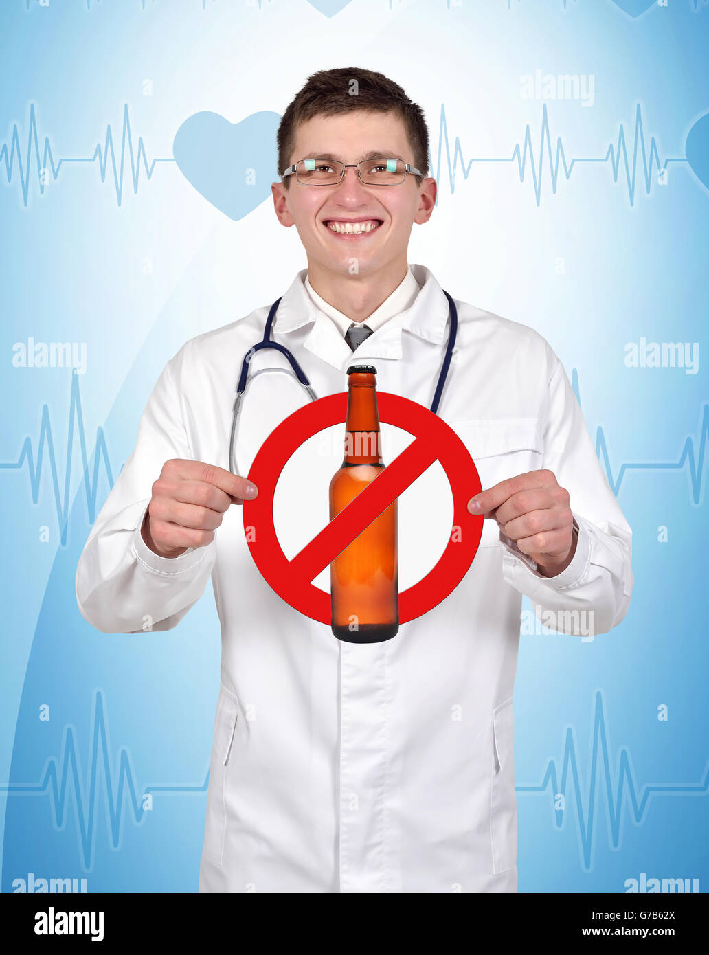 doctor holding stop alcohol symbol on a blue background Stock Photo - Alamy