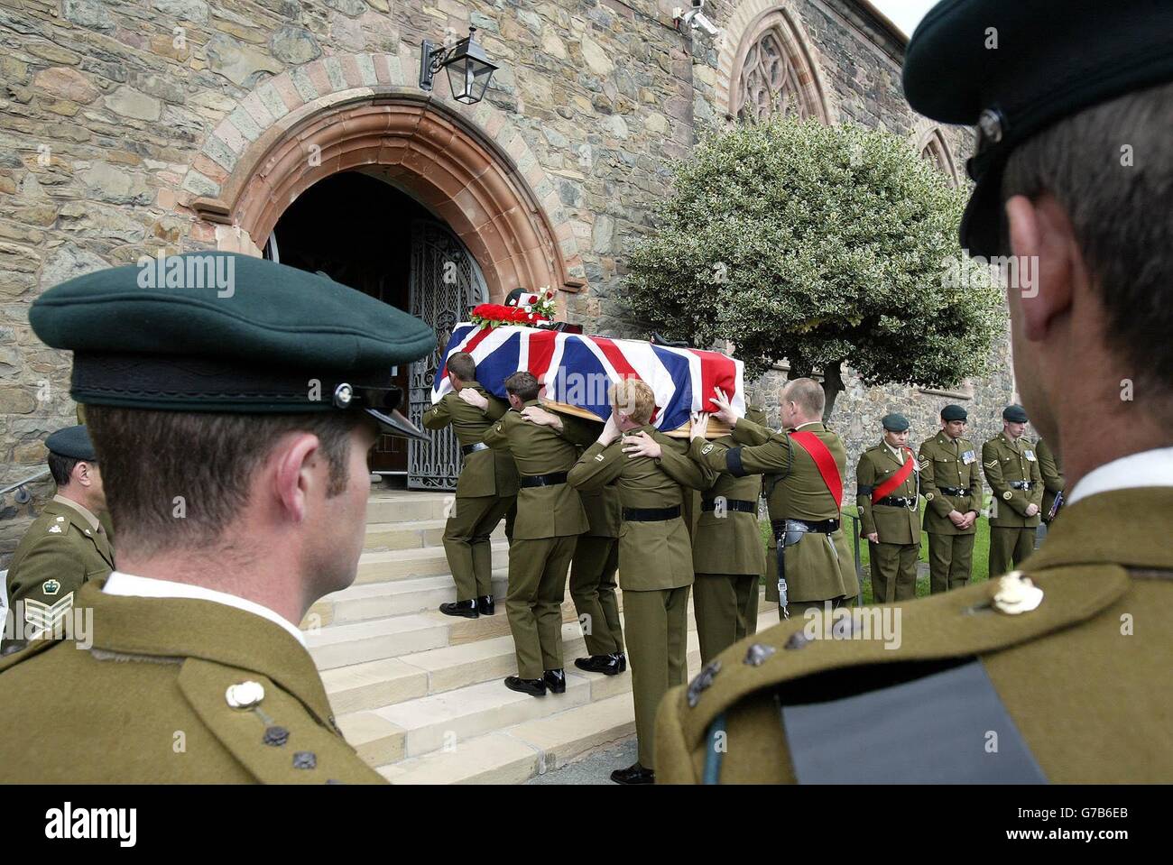 The coffin of Lance Corporal Paul Thomas is carried into St Mary's ...