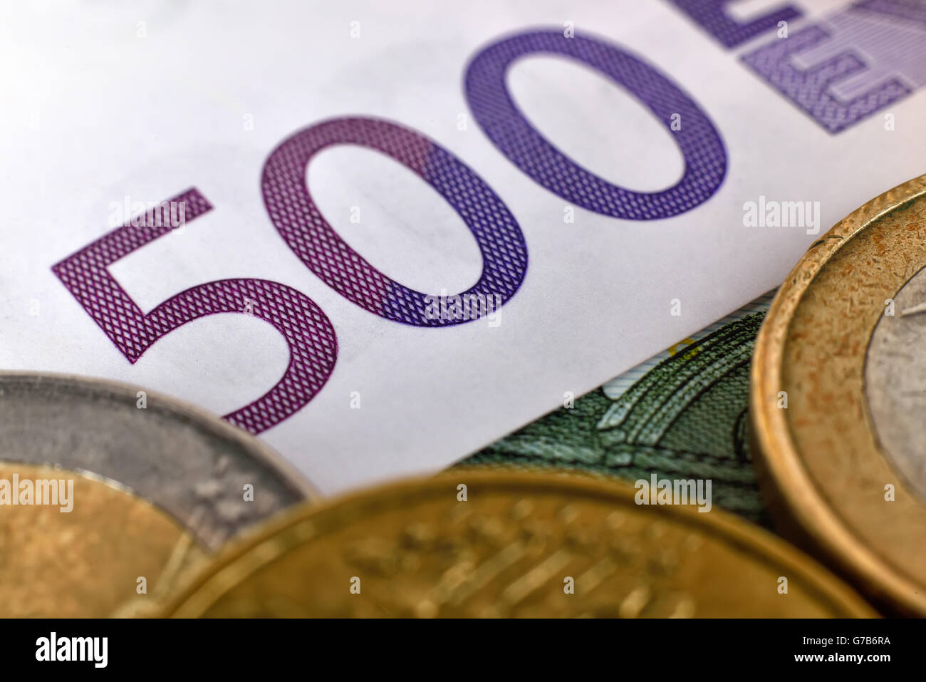 Euro coins and euro banknotes, close up Stock Photo - Alamy