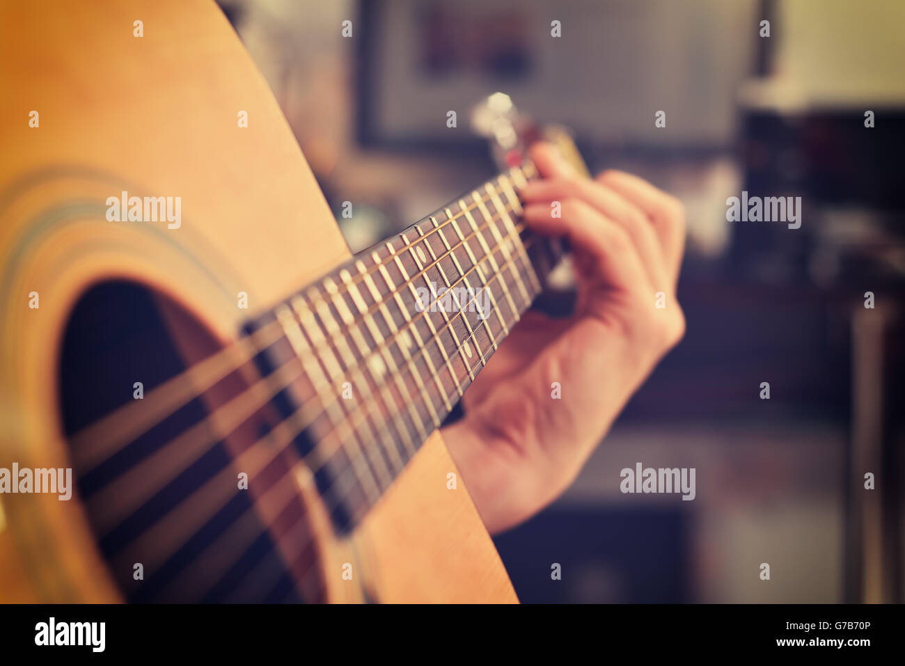 Man Lead Guitarist Playing On Yellow Acoustic Guitar Stock Photo - Alamy