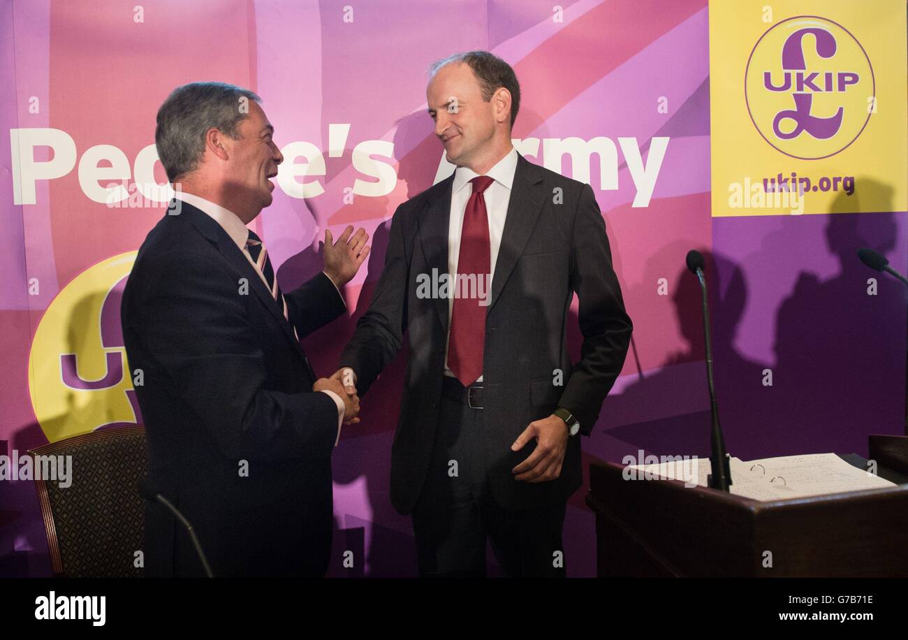UKIP leader Nigel Farage (left) with Douglas Carswell during a press ...