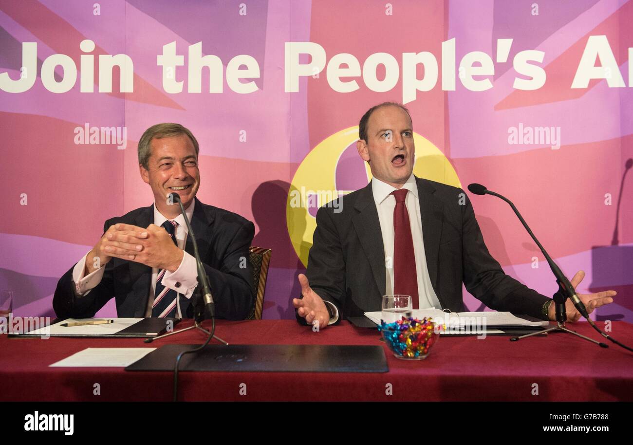 UKIP leader Nigel Farage (left) with Douglas Carswell during a press ...