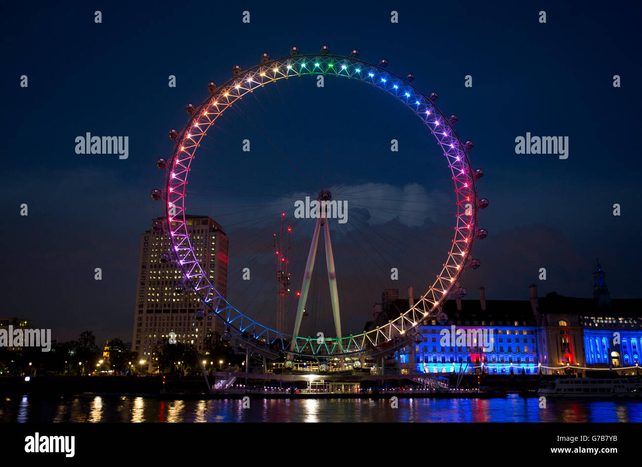 The Coca-Cola London Eye in London is lit up in the colours of the ...