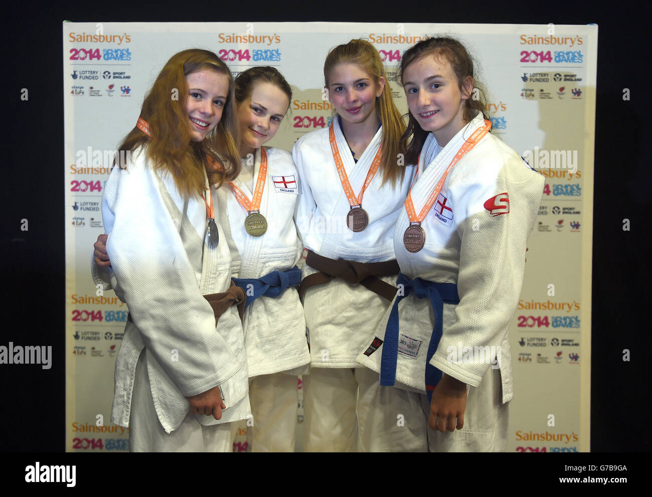 England's Kiera Bateman (second left) with her gold medal, Scotland's ...